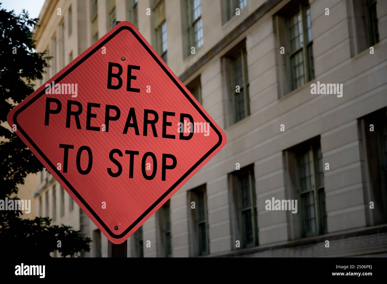 Large bright orange Be Prepared to Stop sign with black lettering on a ...