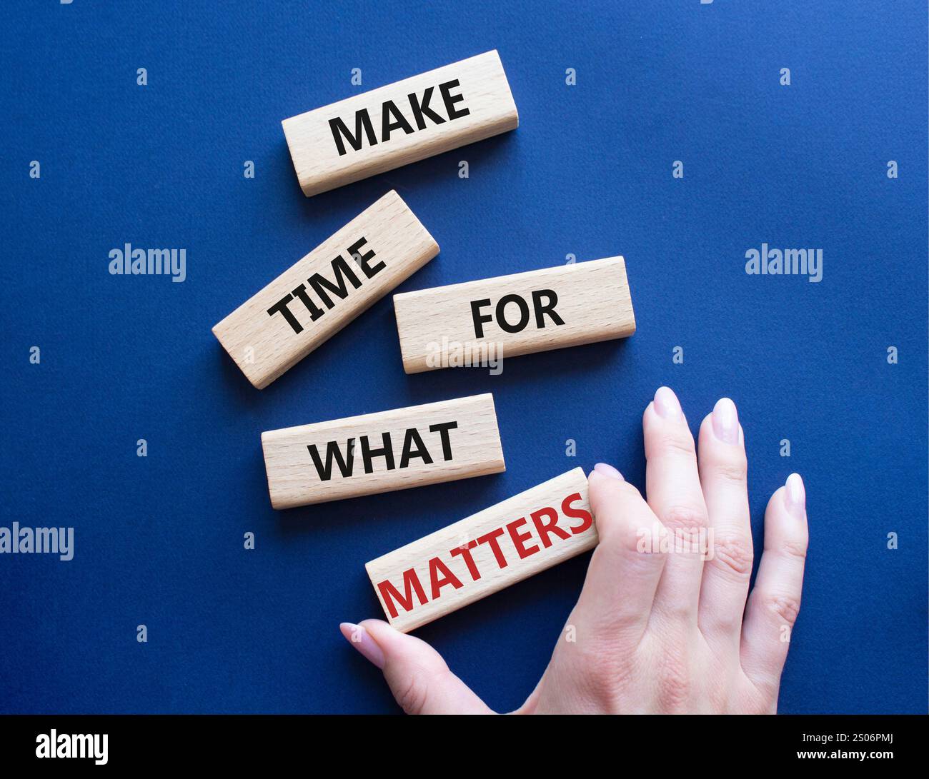 Important thing symbol. Wooden blocks with words Make time for what ...