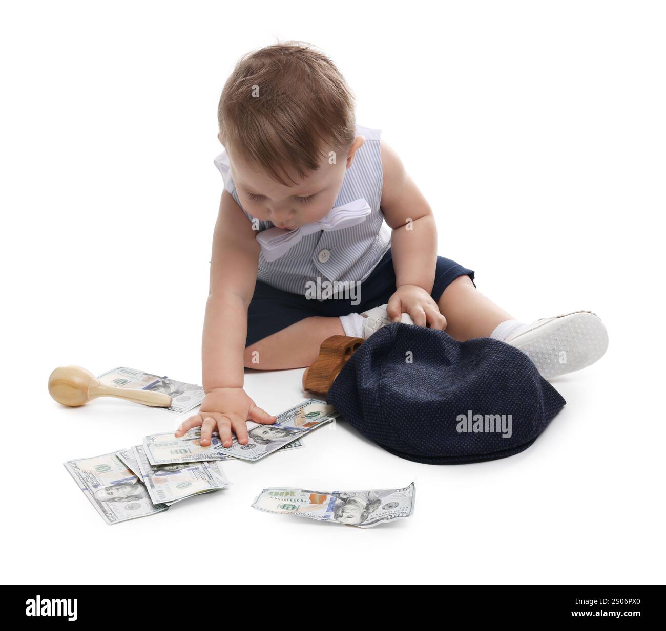 Little baby with money on white background Stock Photo - Alamy