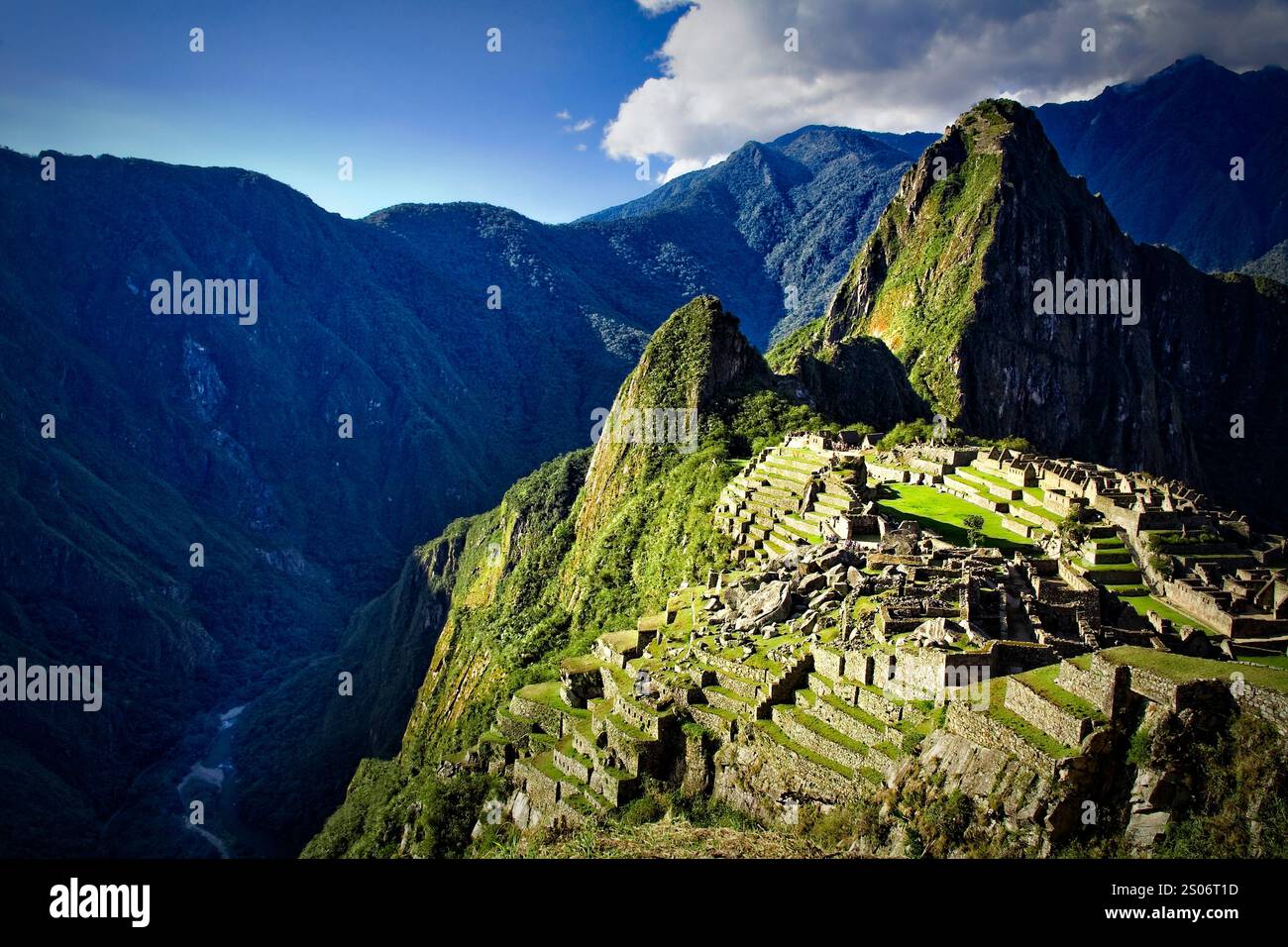 Machu Picchu radiates a golden glow under the soft light of the morning ...