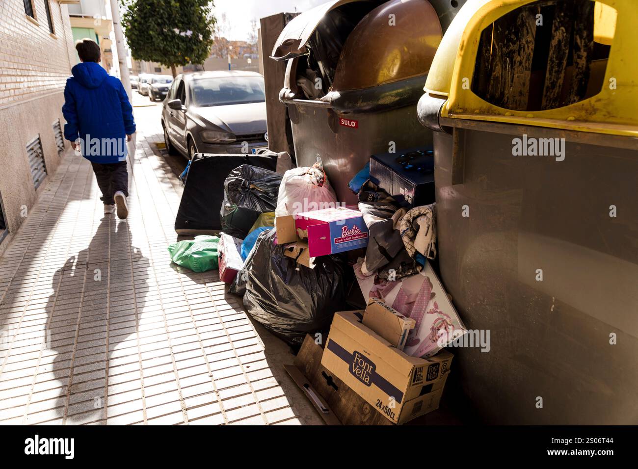 Trash garbage cans full of gift wrapping paper, on December 25, 2023 ...