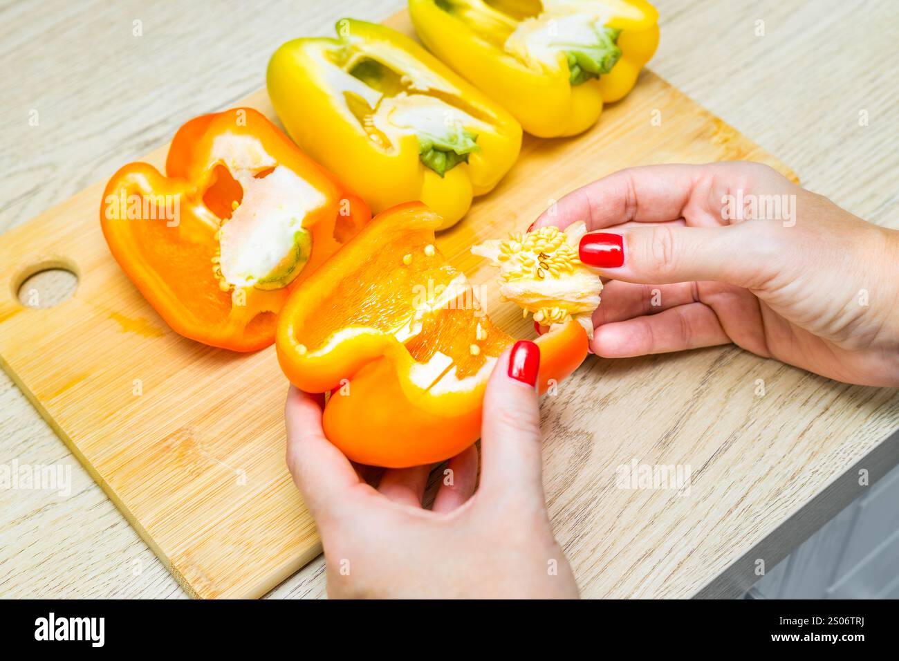Chef cutting orange bell hi-res stock photography and images - Alamy