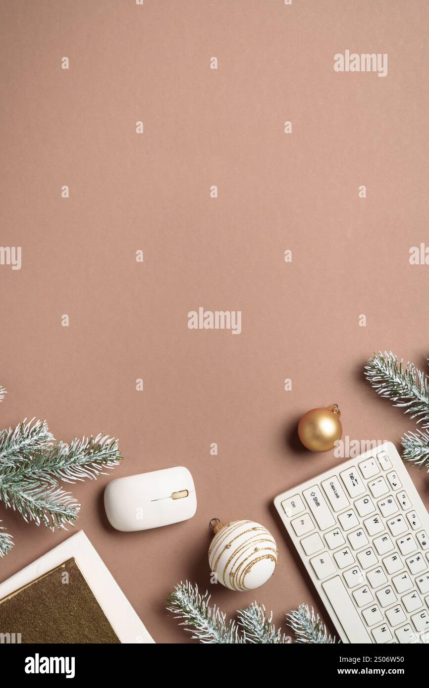 Cozy Winter office desk. Keyboard, candle and winter decor at brown ...