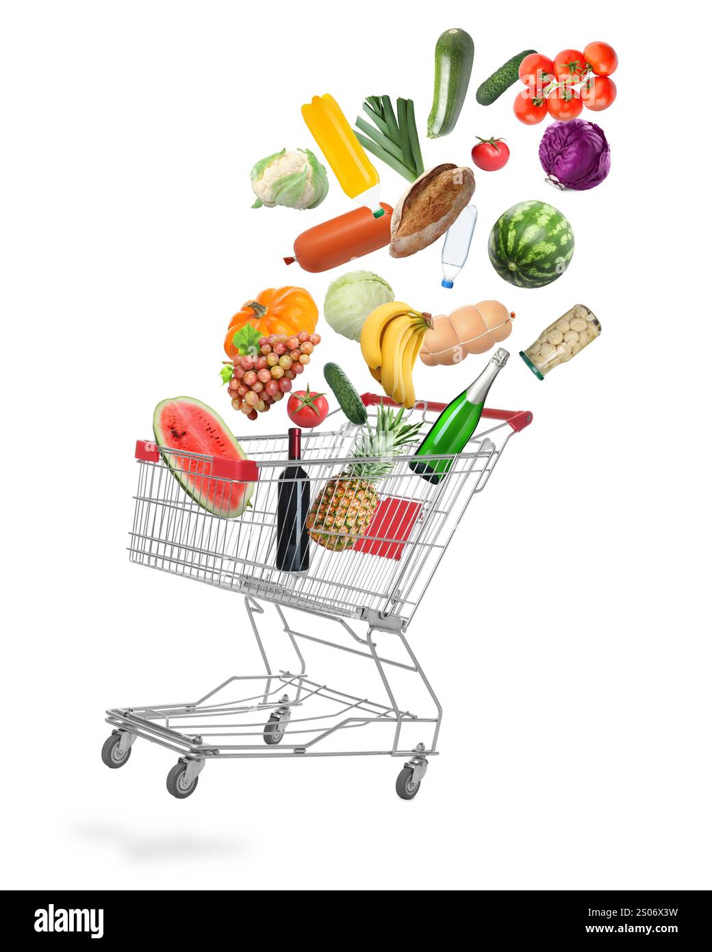 Many different products falling into shopping cart on white background ...