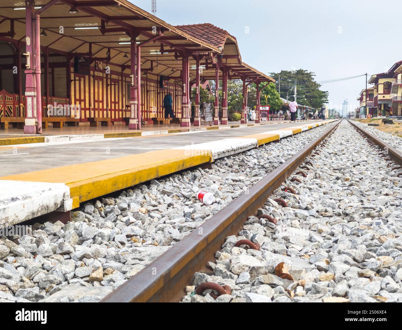 Railroad tracks running between the original older Thai Railway station ...