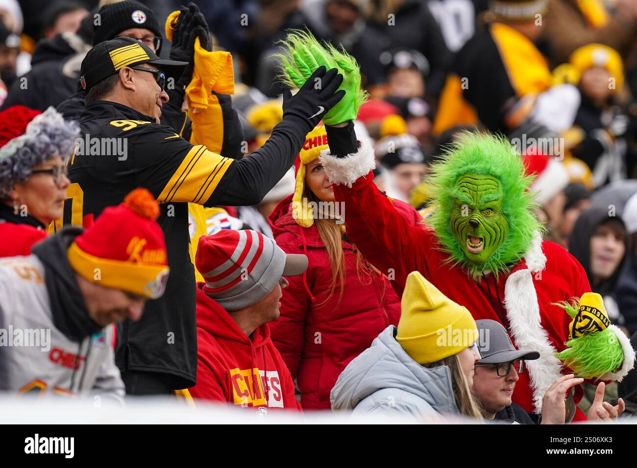 Fans cheer on Christmas day during the first half of an NFL football ...