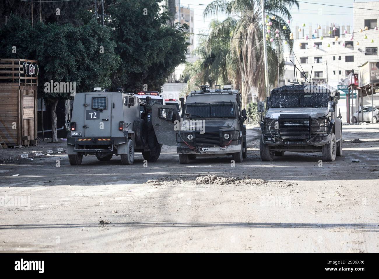 Tulkarm, Palestine. 25th Dec, 2024. Israeli military vehicles are seen ...