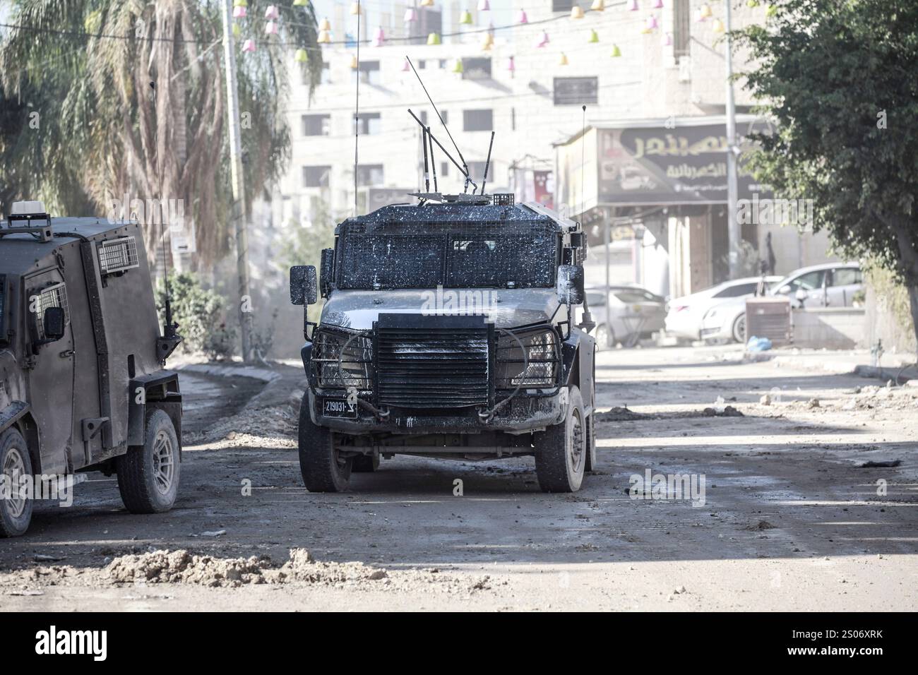 Tulkarm, Palestine. 25th Dec, 2024. Israeli military vehicles are seen ...