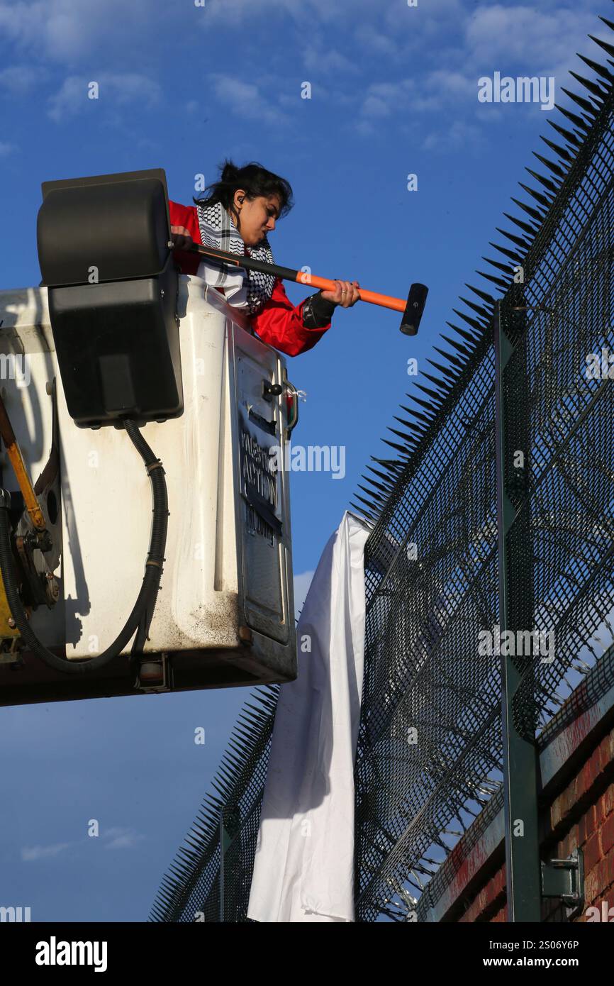 Shenstone, England, UK. 25th Dec, 2024. A Palestine Actionist uses an ...