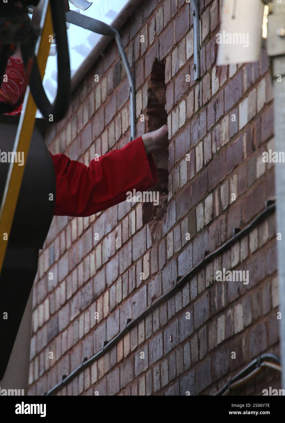 Shenstone, England, UK. 25th Dec, 2024. A Palestine Actionist puts his ...