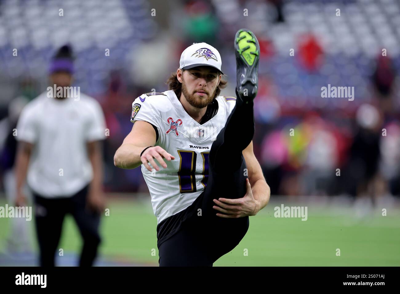 Houston, Texas, USA. 25th Dec, 2024. Baltimore Ravens punter Jordan ...