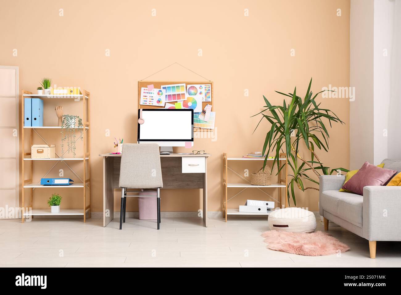 Interior of designer's office with workplace and shelf units Stock ...