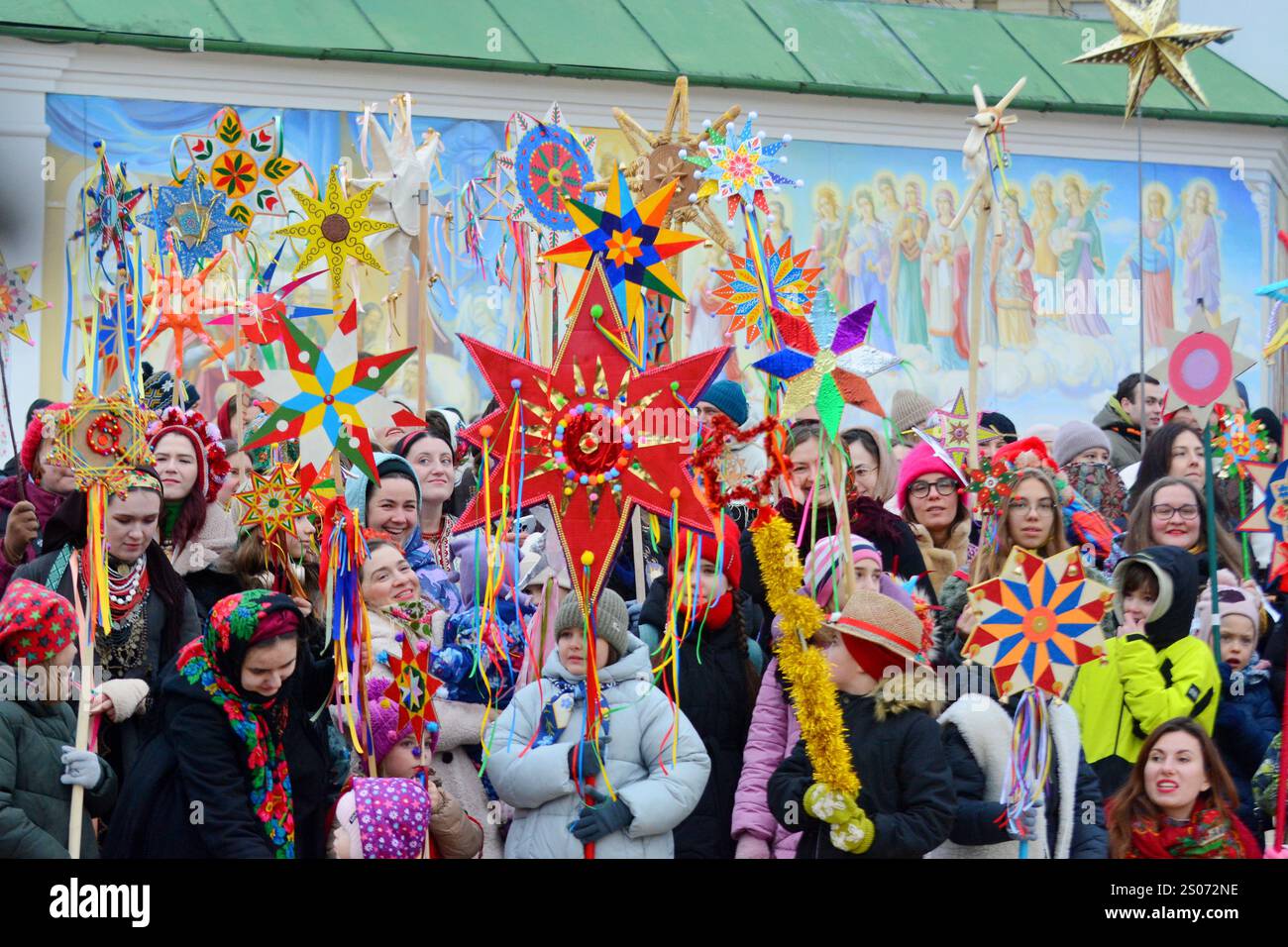 Kyiv, Ukraine. 25th Dec, 2024. People in traditional costumes hold ...
