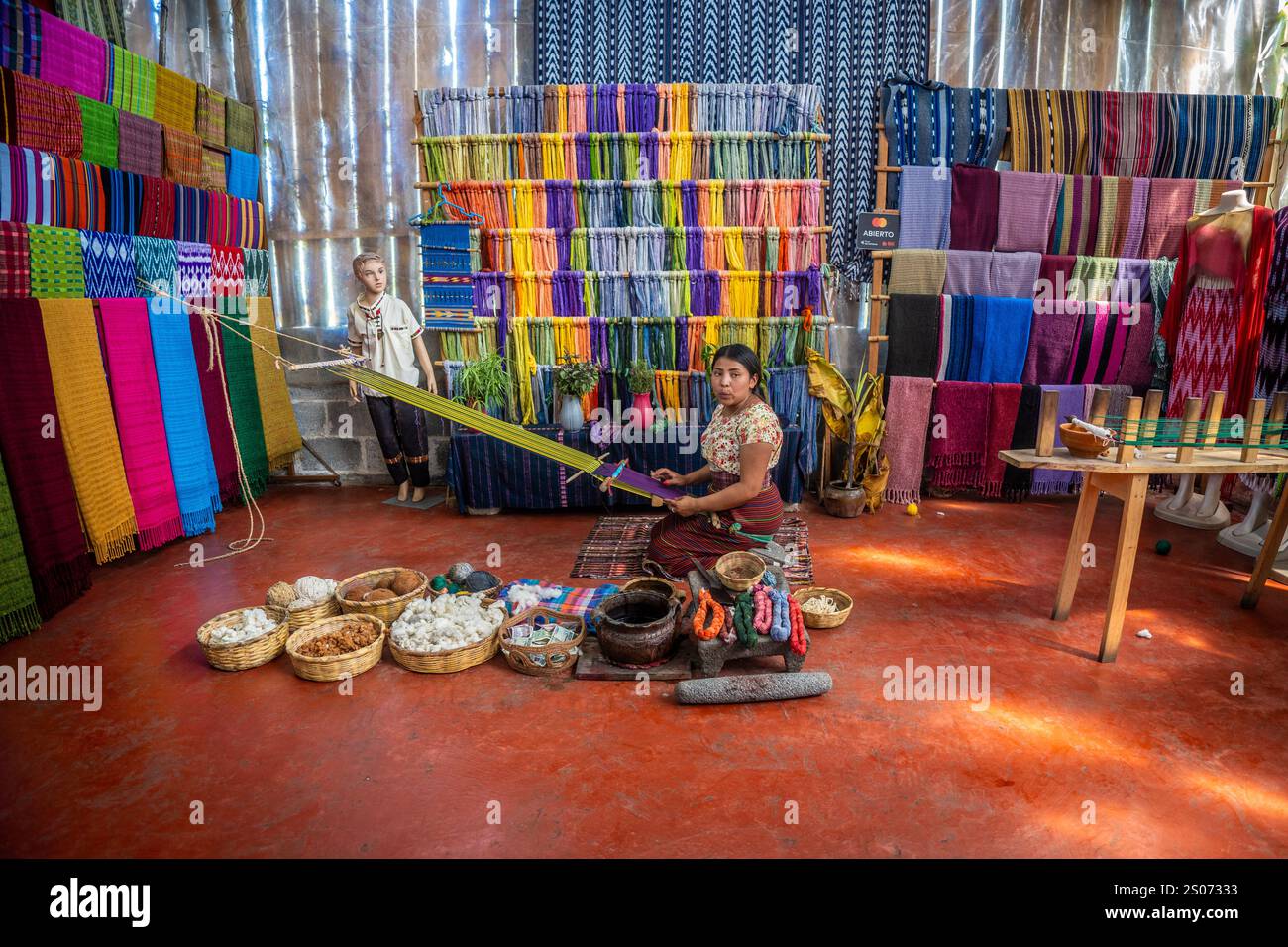 Woman making textiles San Juan la Laguna, Lake Atitlan, Guatemala Stock ...