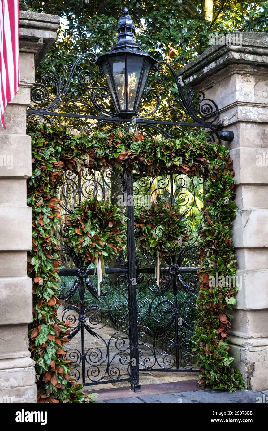 Christmas Magnolia roping decorate the famous Sword Gate at 32 Legare ...