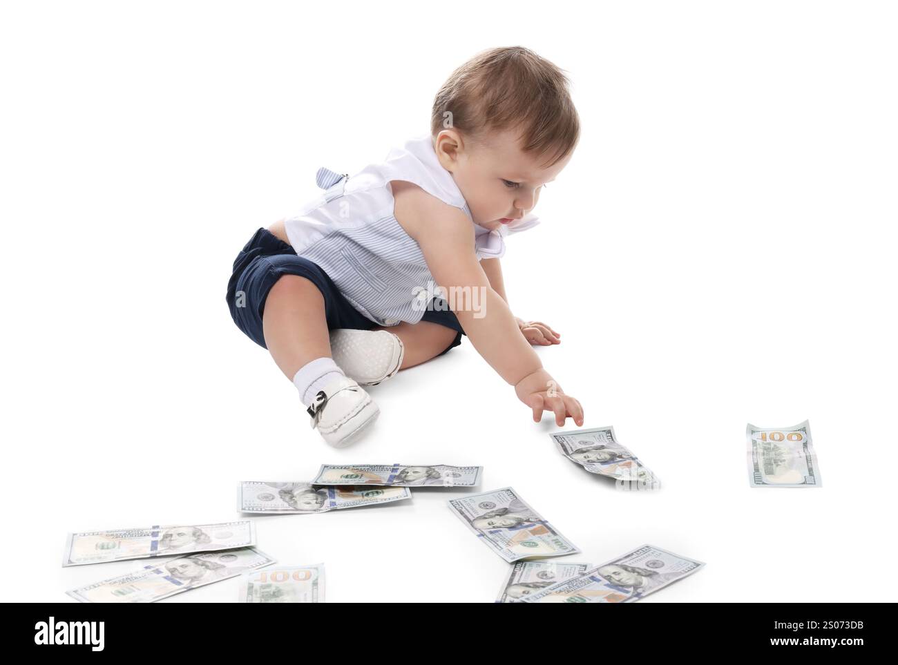 Little baby with money on white background Stock Photo - Alamy