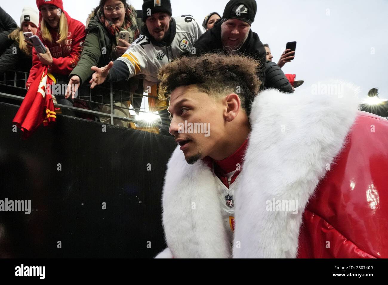 Fans cheer for Kansas City Chiefs quarterback Patrick Mahomes after an ...