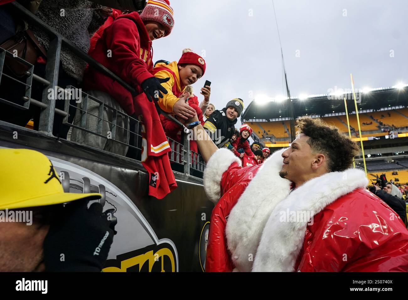 Fans cheer for Kansas City Chiefs quarterback Patrick Mahomes after an ...