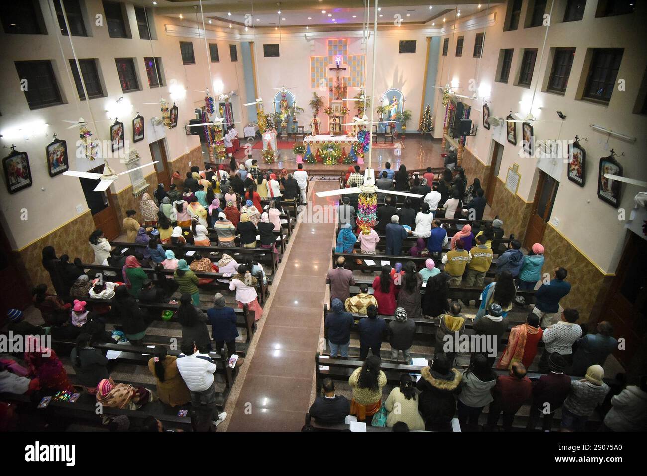 PATNA, INDIA - DECEMBER 25: Devotees praying on the occasion of ...