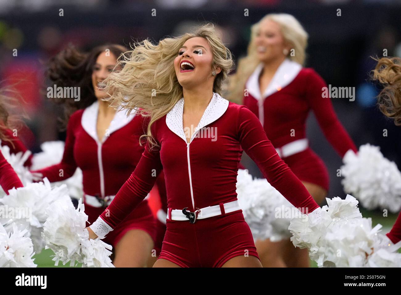 Houston Texans cheerleaders perform before an NFL football game between ...