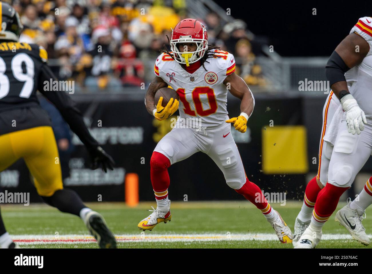 Kansas City Chiefs running back Isiah Pacheco (10) rushes during an NFL ...
