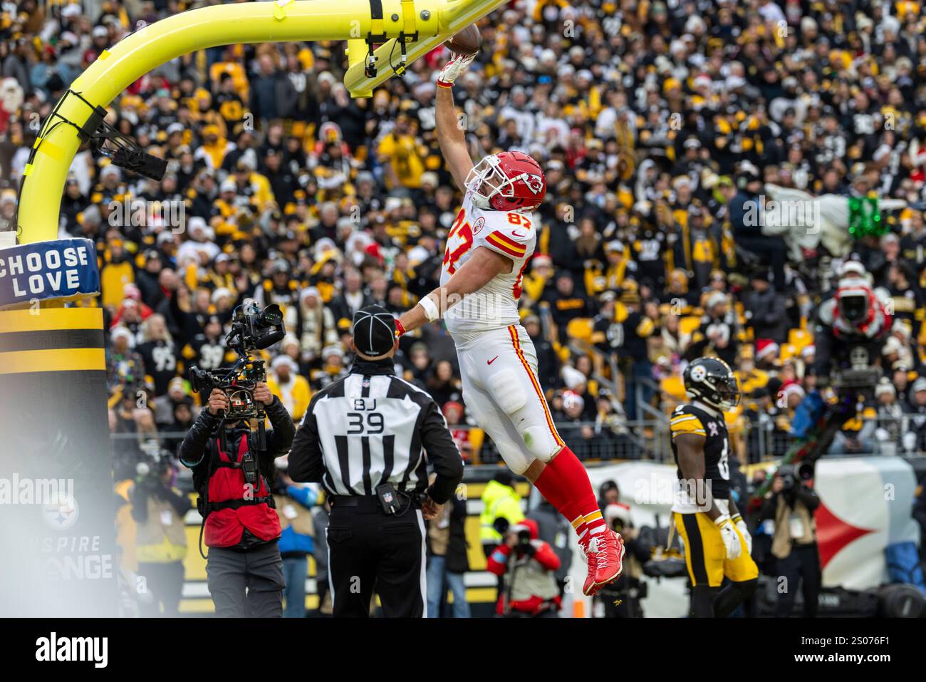 Kansas City Chiefs tight end Travis Kelce (87) dunks the football over ...
