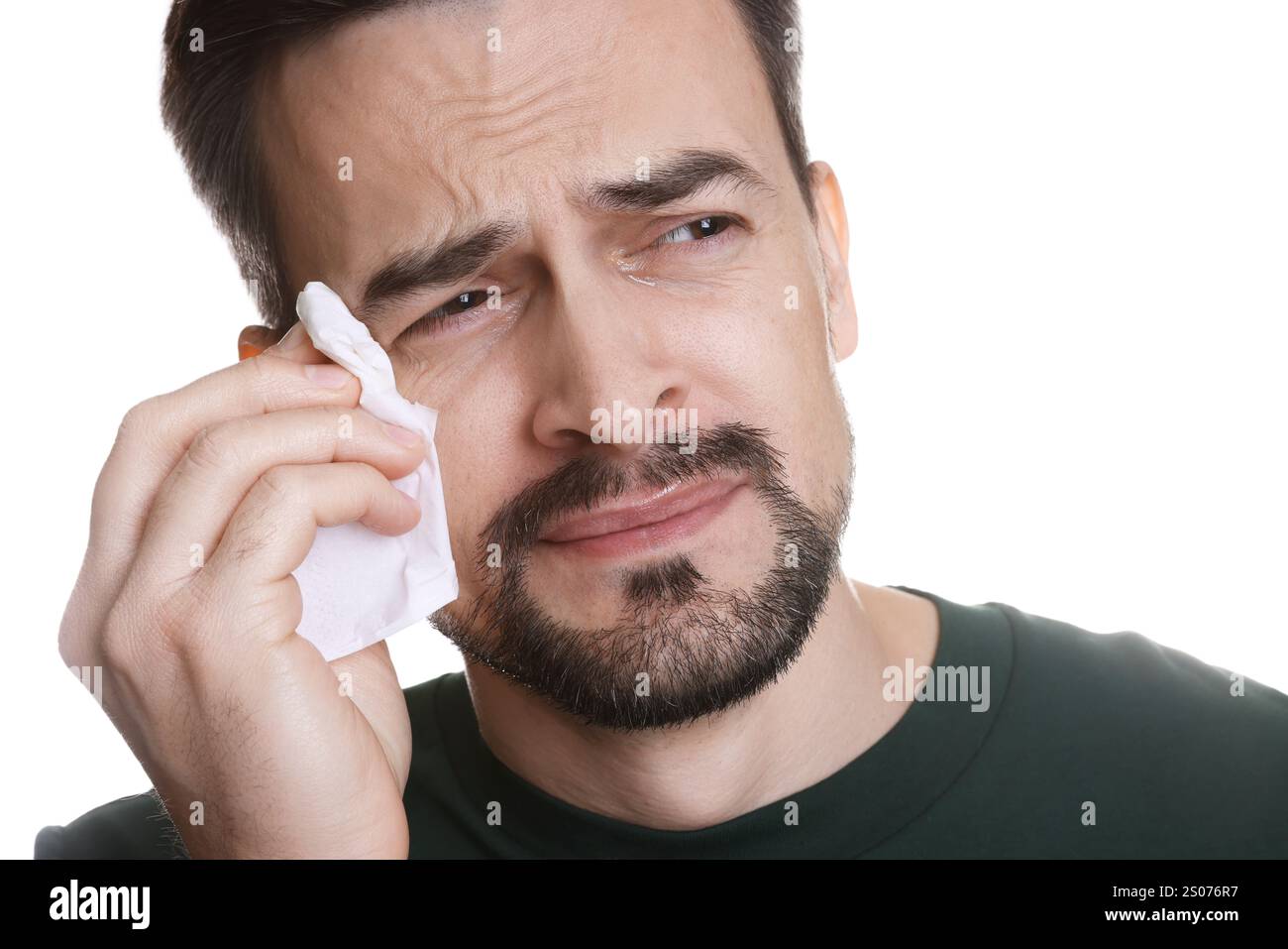Sad man with paper tissue crying on white background Stock Photo - Alamy