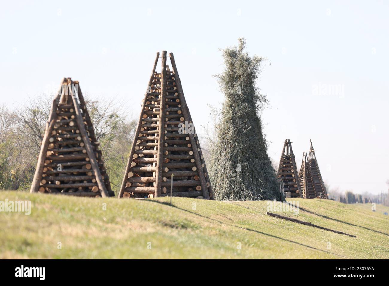 Garyville, United States. 24th Dec, 2024. A row of bonfires are ...