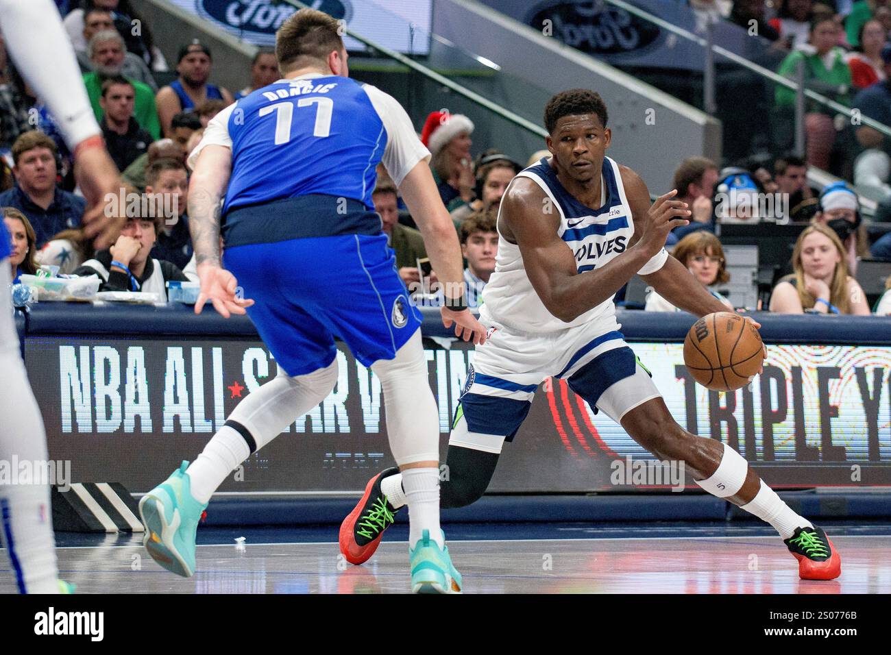 Minnesota Timberwolves guard Anthony Edwards (5) makes a move on Dallas ...