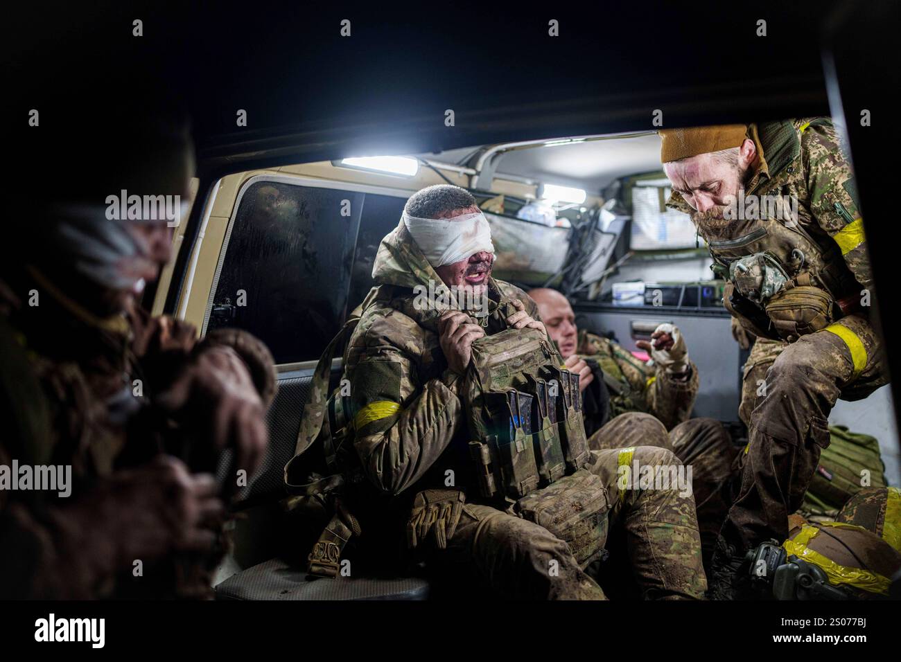 Injured Ukrainian servicemen arrive from the battlefield at Medical ...