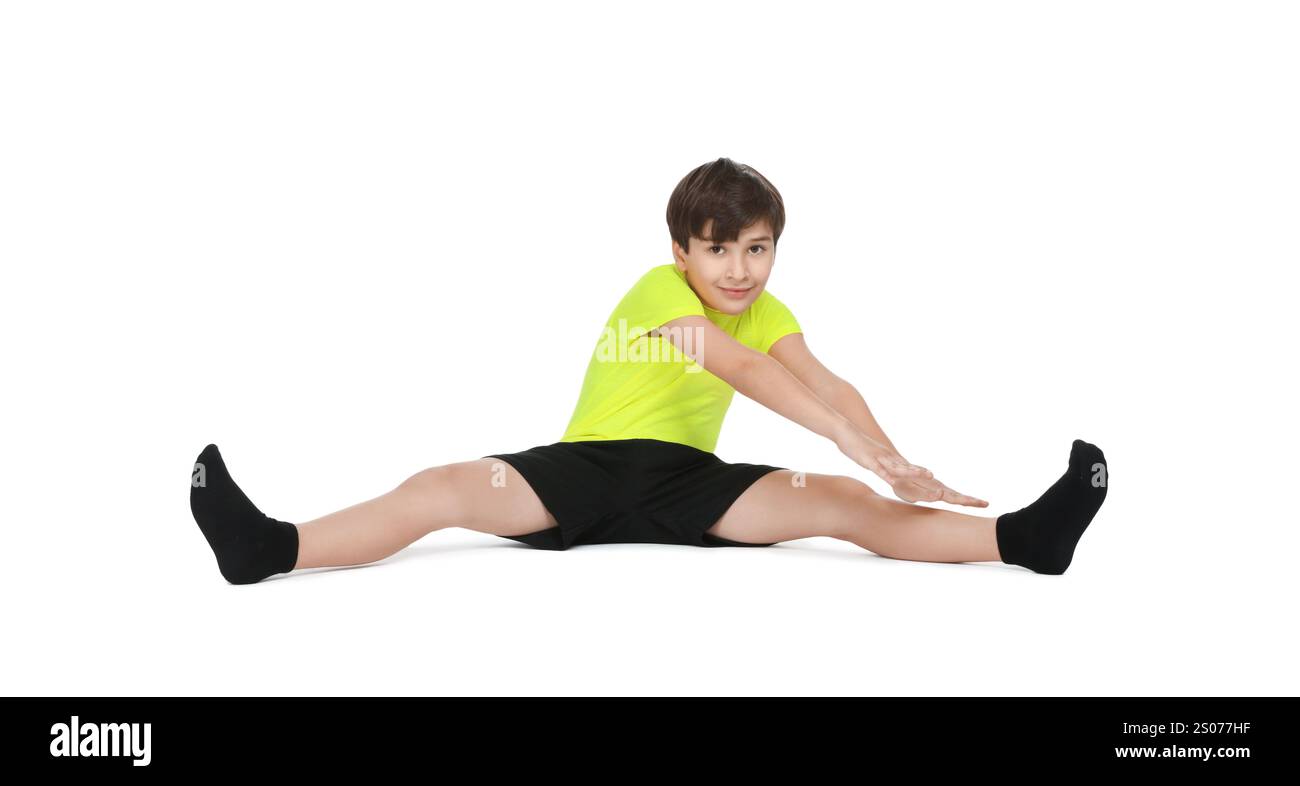 Boy doing exercise on white background. Sport activity Stock Photo - Alamy