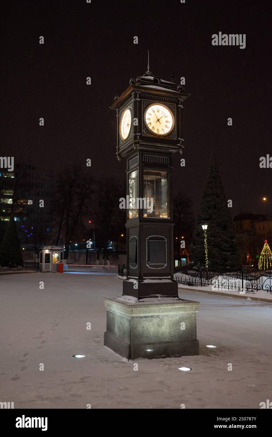 English-style clock tower in winter city Stock Photo - Alamy