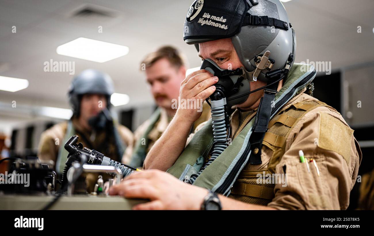 A U.S. Airman assigned to the 69th Expeditionary Bomb Squadron tests an ...