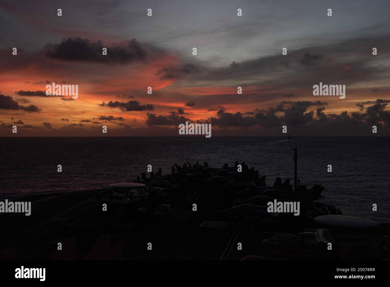 241223-N-GC639-1003 BALABAC STRAIT (Dec. 23, 2024) The Arleigh Burke ...