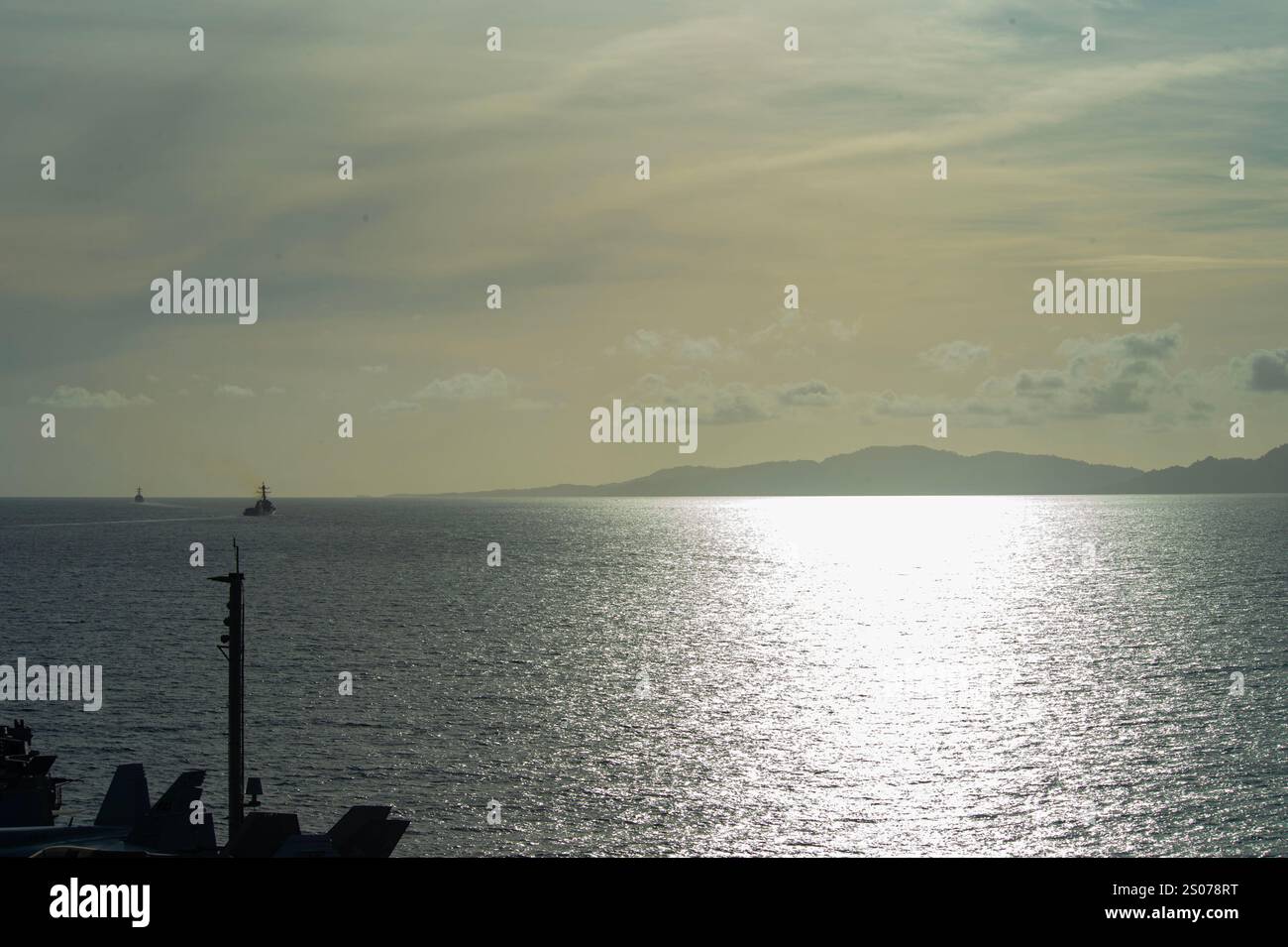 241223-N-GC571-2131 BALABAC STRAIT (Dec. 23, 2024) The Arleigh Burke ...