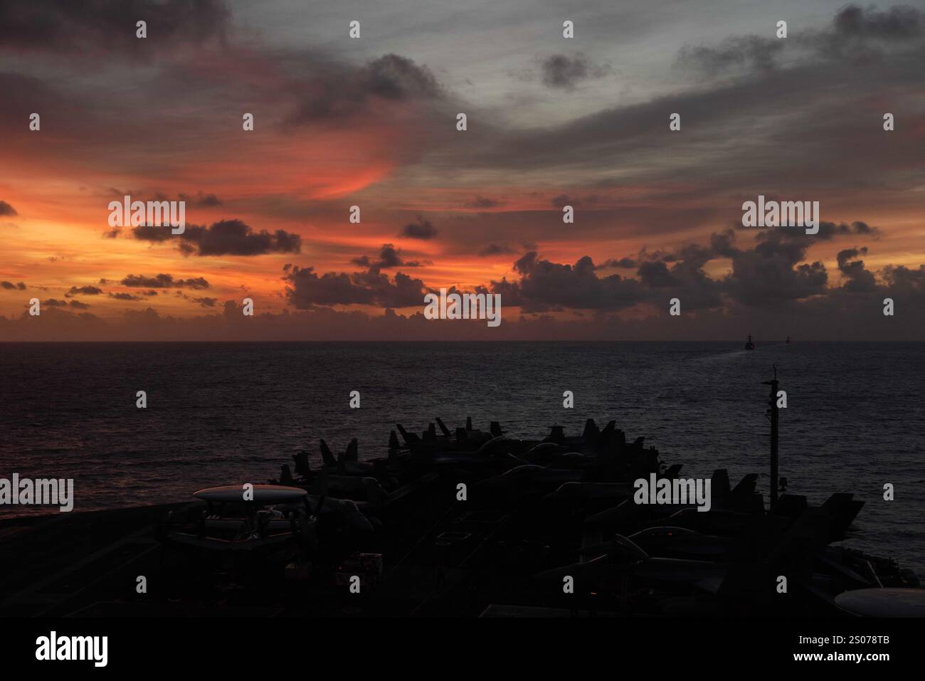 241223-N-GC639-1008 BALABAC STRAIT (Dec. 23, 2024) The Arleigh Burke ...