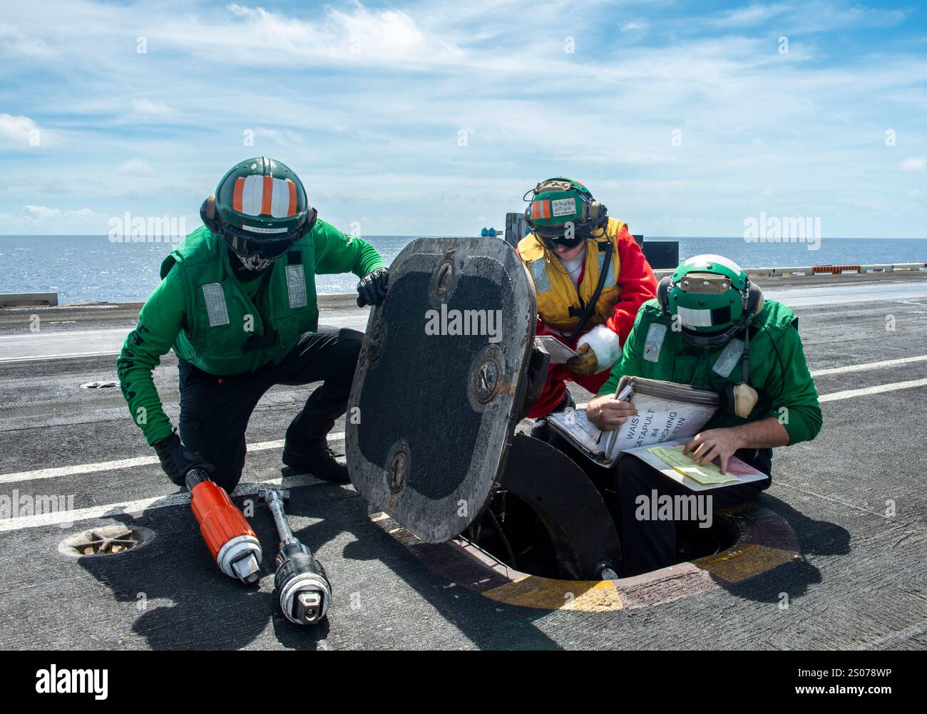 241224-N-FS097-1209 SOUTH CHINA SEA (Dec. 24, 2024) – Sailors conduct ...