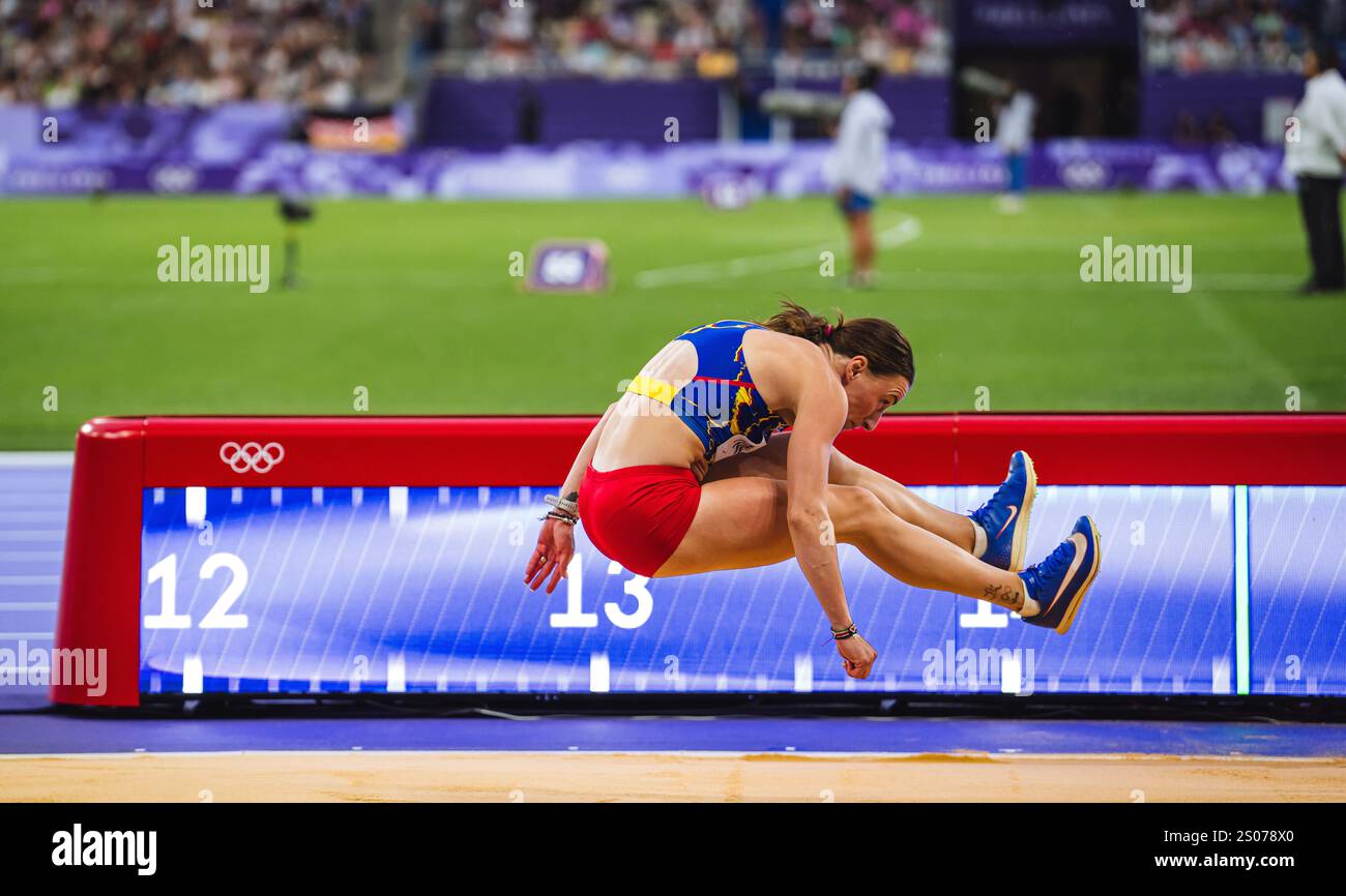 Elena Panțuroiu participating in the triple jump at the Paris 2024 ...