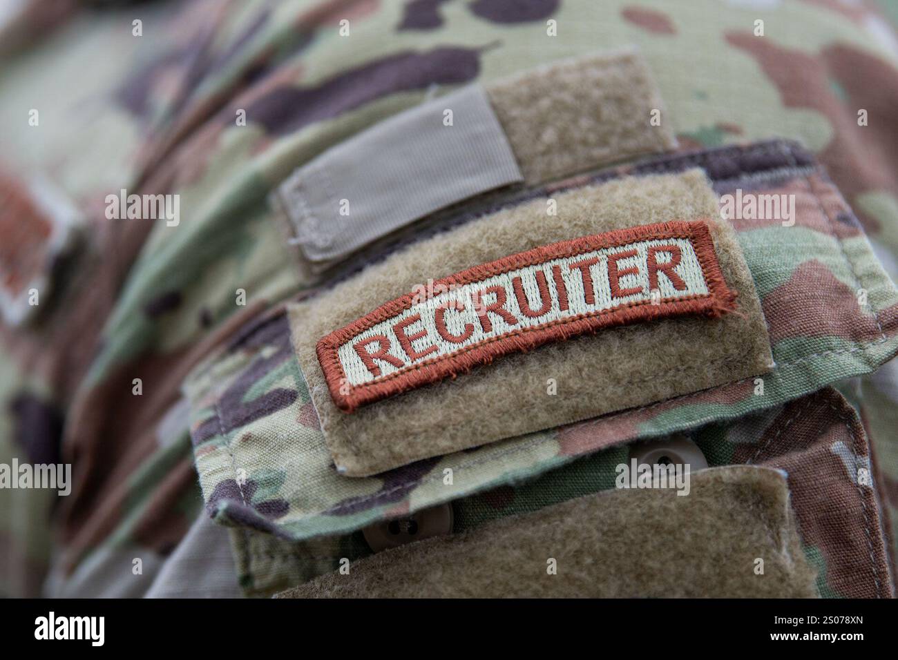 A U.S. Air Force Oklahoma Air National Guard recruiter wears the OCP ...