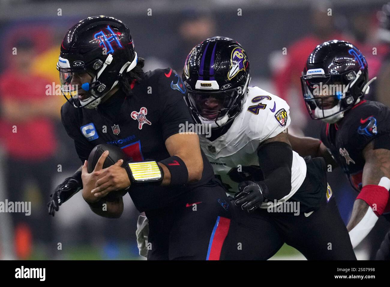 Houston Texans quarterback C.J. Stroud is sacked by Baltimore Ravens ...