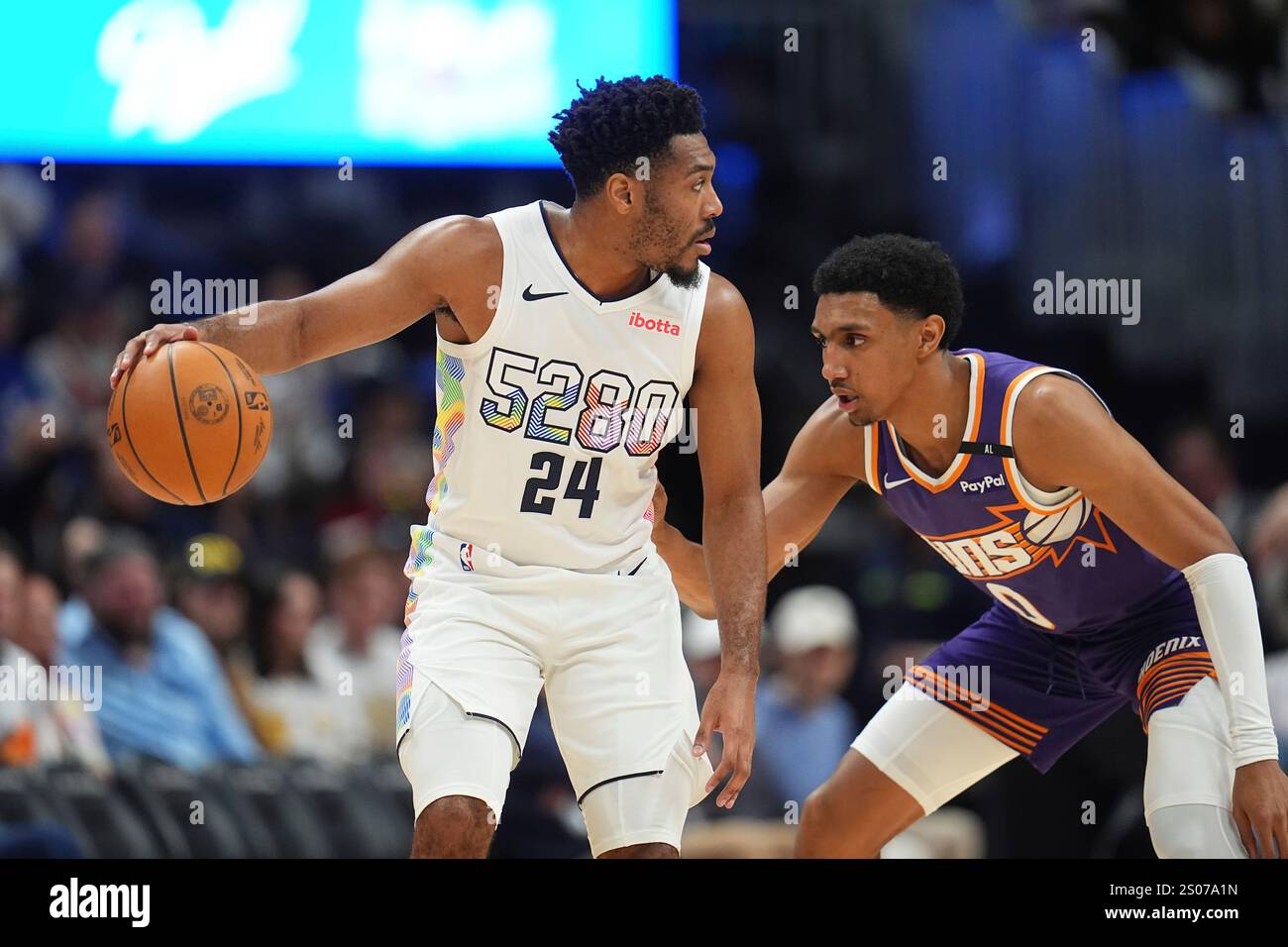Denver Nuggets guard Jalen Pickett (24) and Phoenix Suns forward Ryan ...