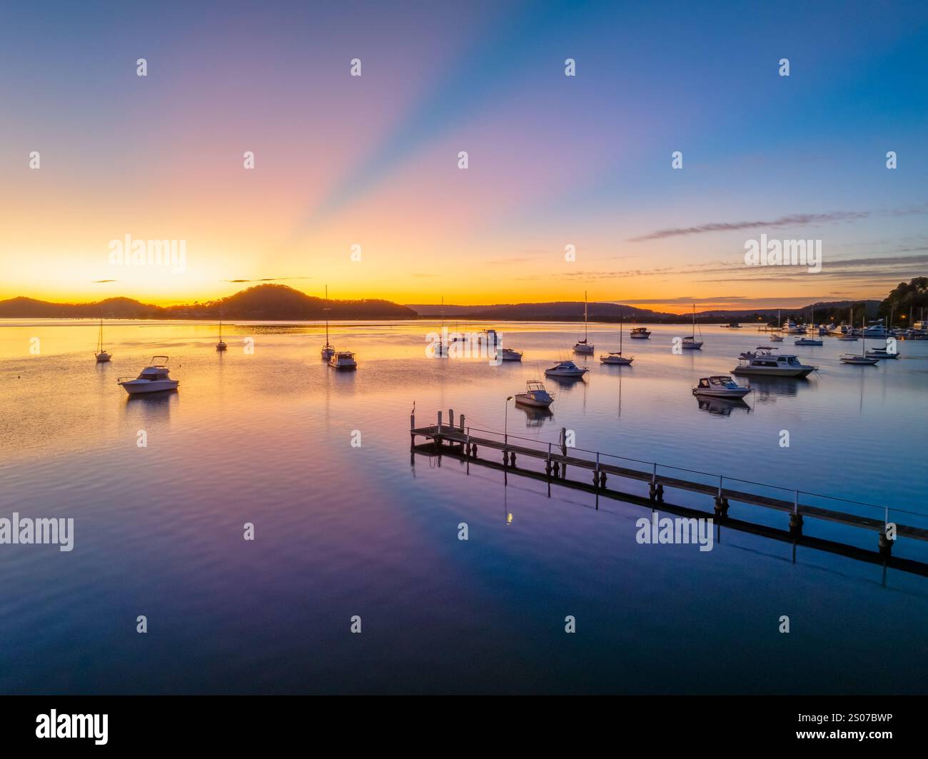 Sunrise and boats on Brisbane Water at Koolewong on the Central Coast ...