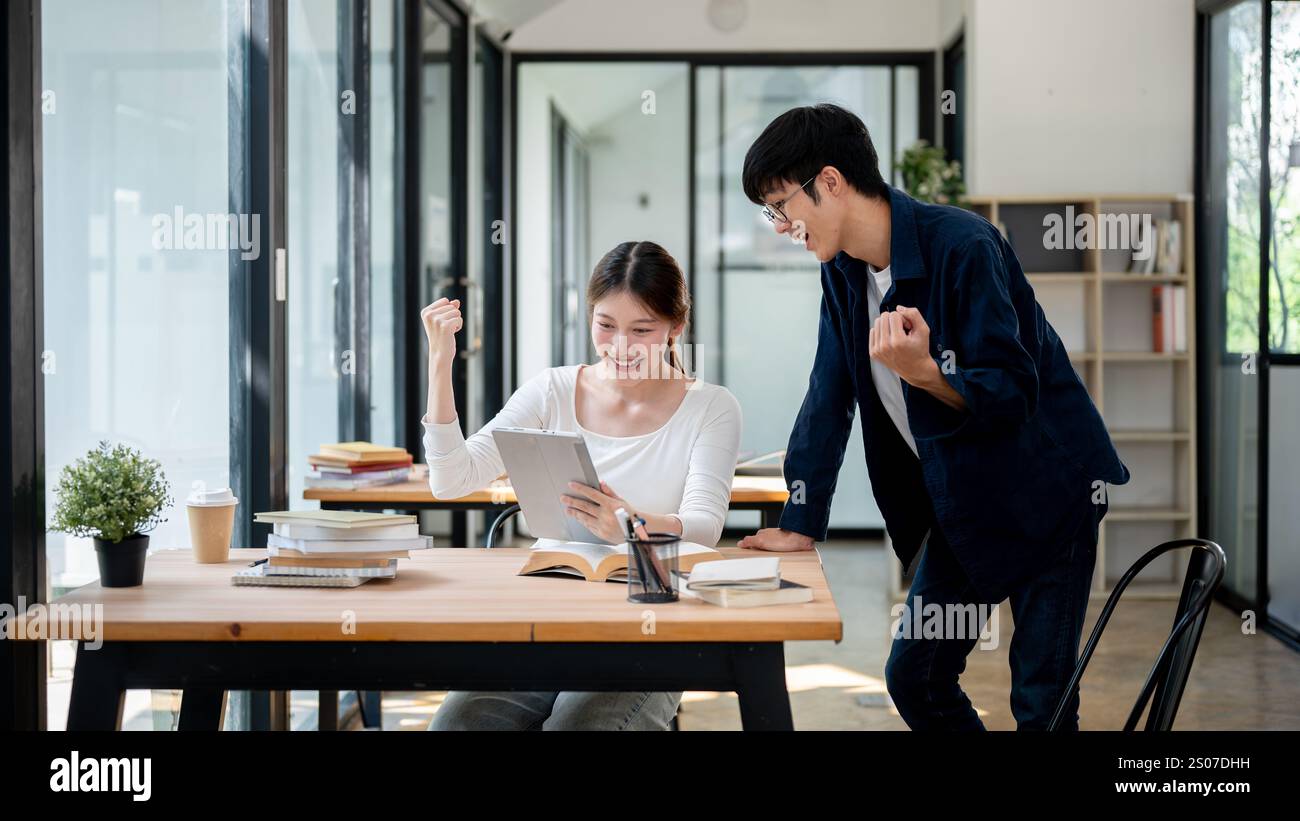 Students celebrating exam success hi-res stock photography and images ...