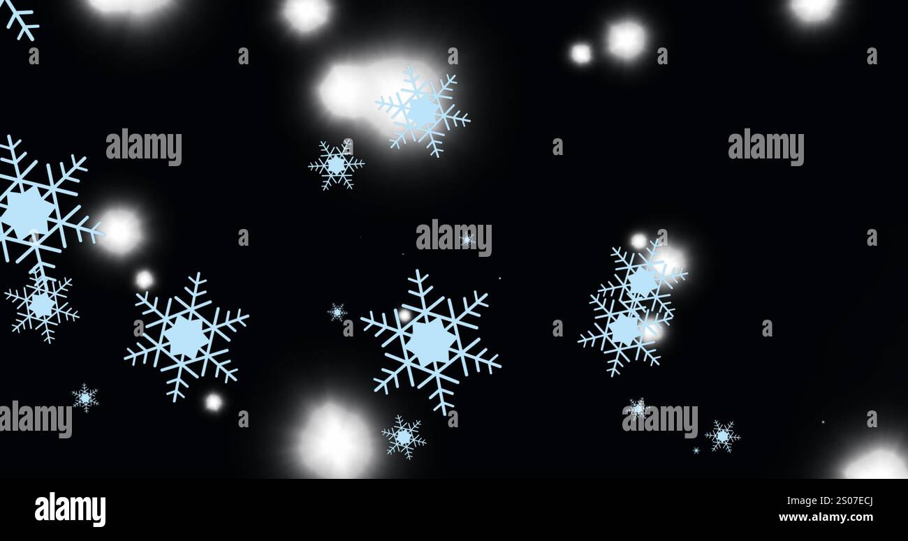 Image of snowflakes and white spots of light floating against black ...
