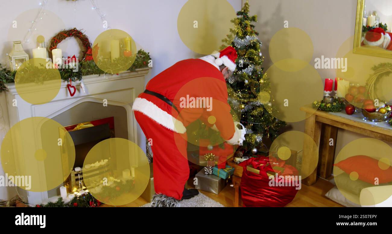 Image of dots moving over santa claus leaving presents under christmas ...