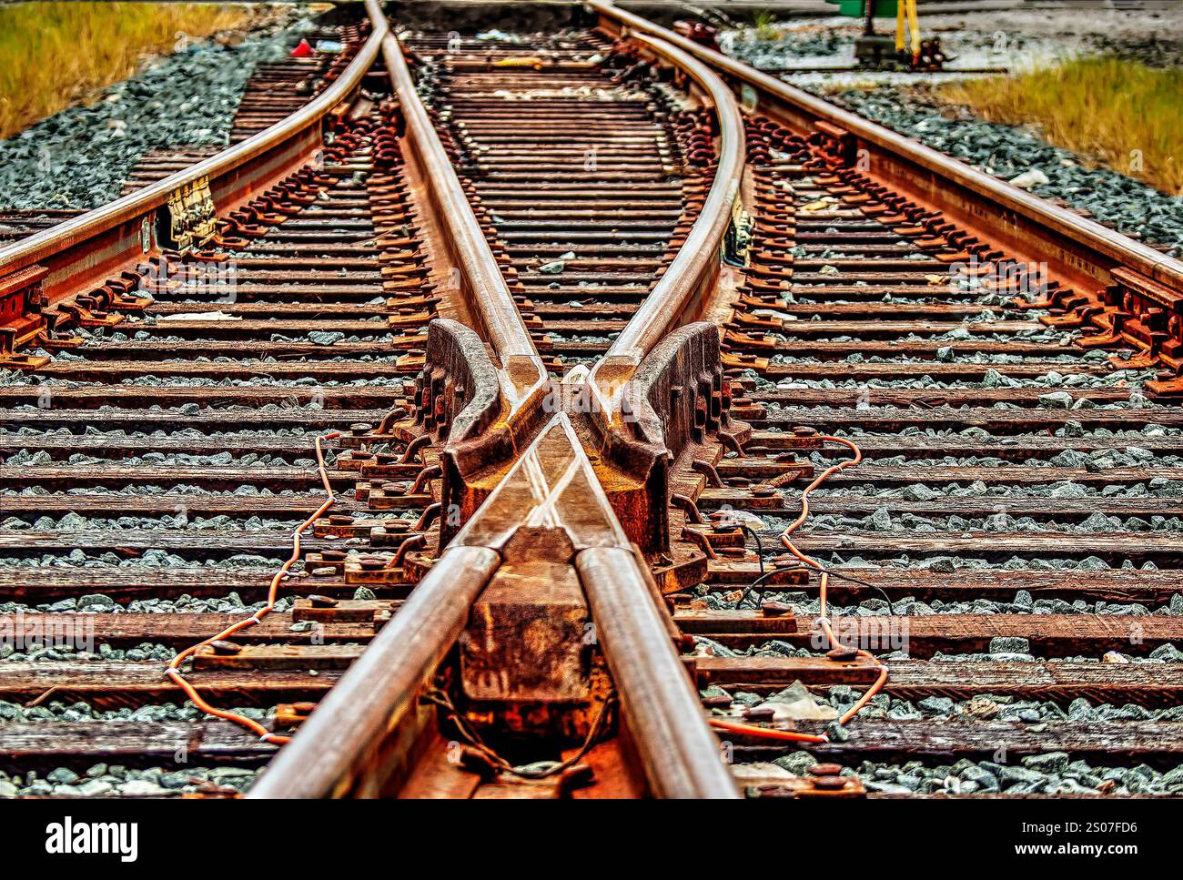 Railroad track switch frog to direction or merging Stock Photo - Alamy