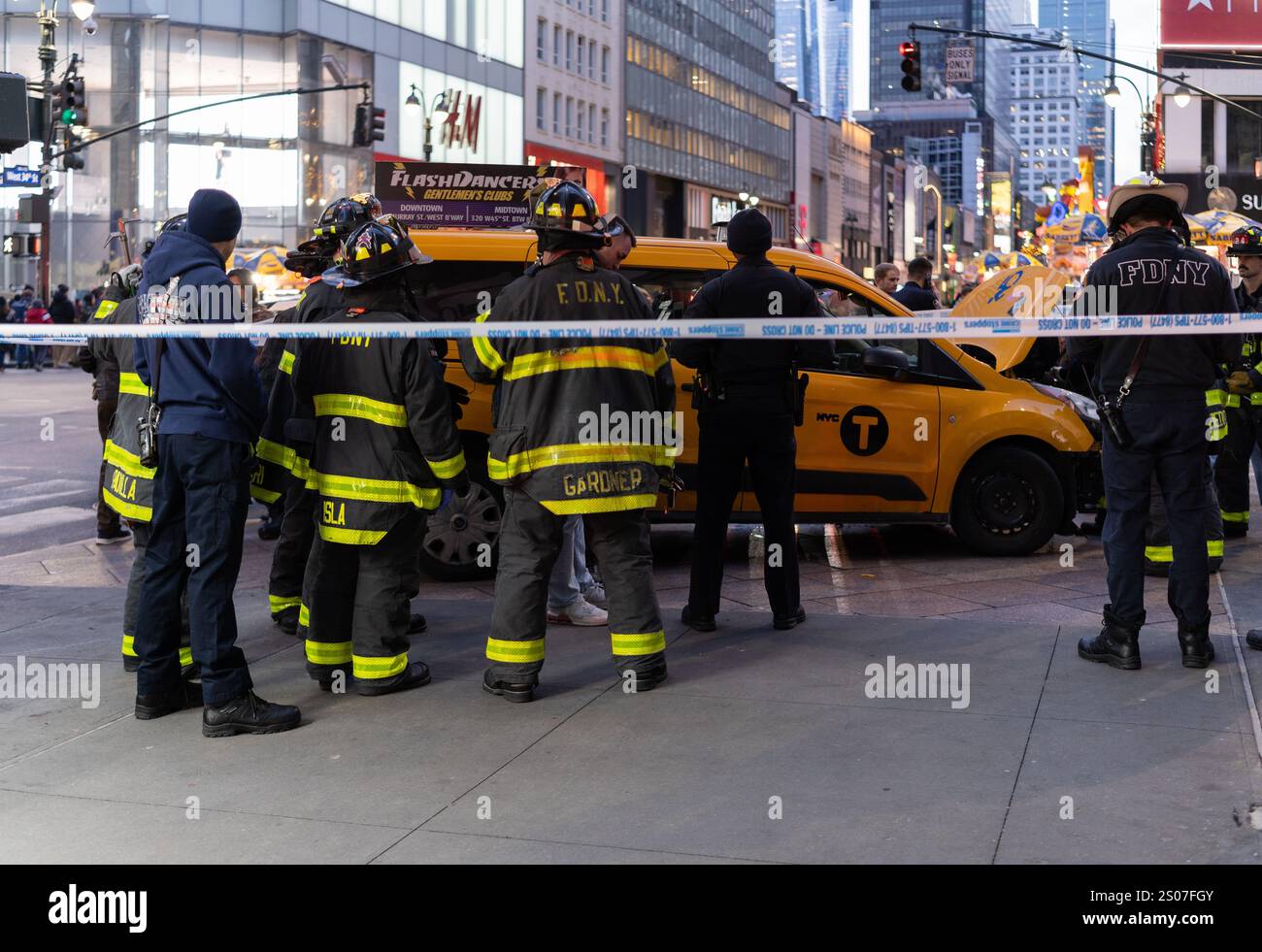 New York Ciy, USA. 25th Dec, 2025. A taxi cab jumped the curb hitting ...