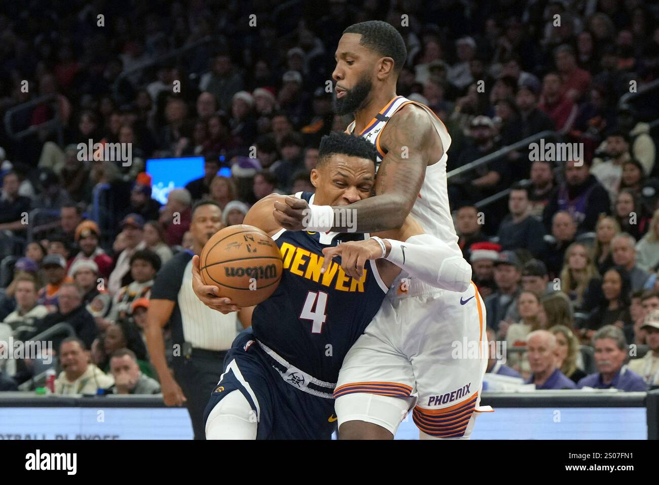 Denver Nuggets guard Russell Westbrook (4) drives on Phoenix Suns ...
