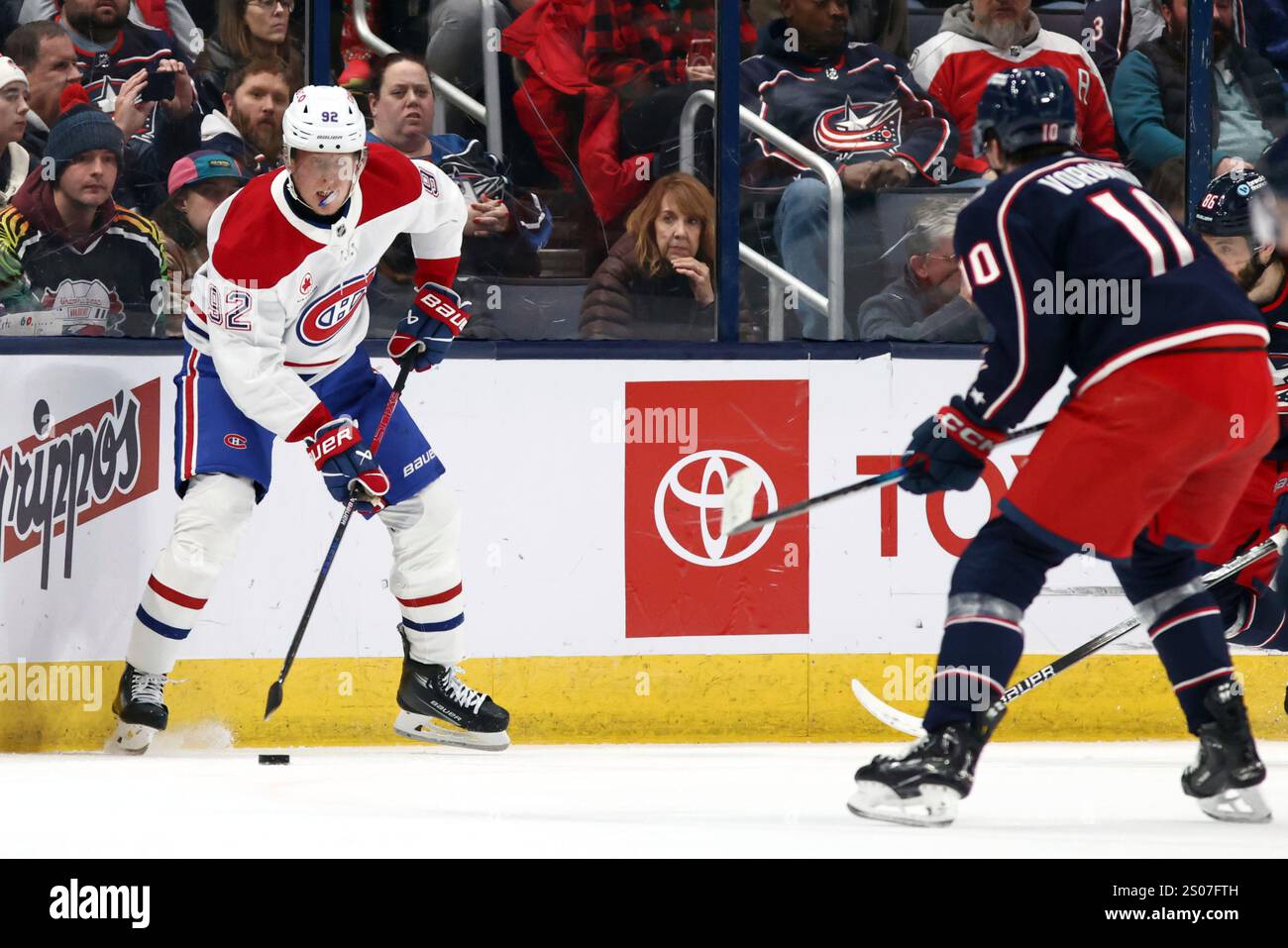 Montreal Canadiens forward Patrik Laine, left, controls the puck in ...