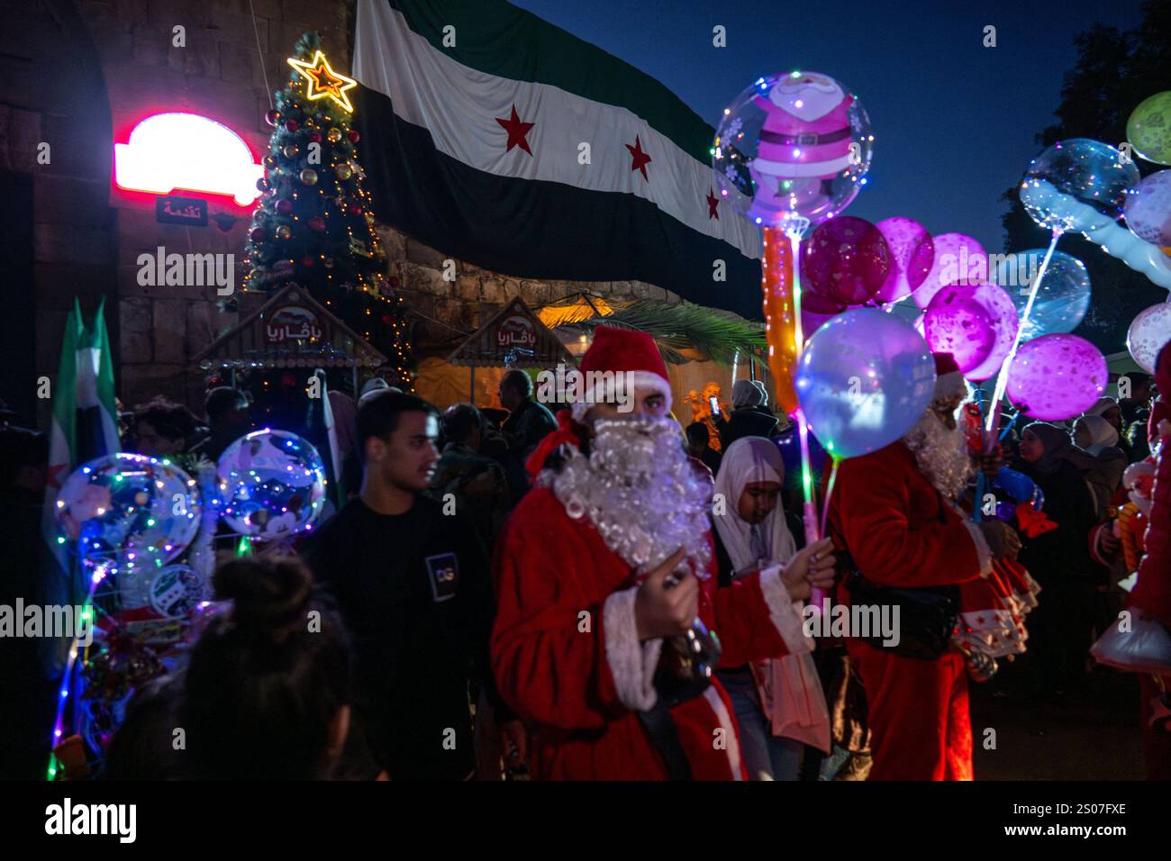 Damascus, Syria. 25th Dec, 2024. Syrians celebrate Christmas mass at ...